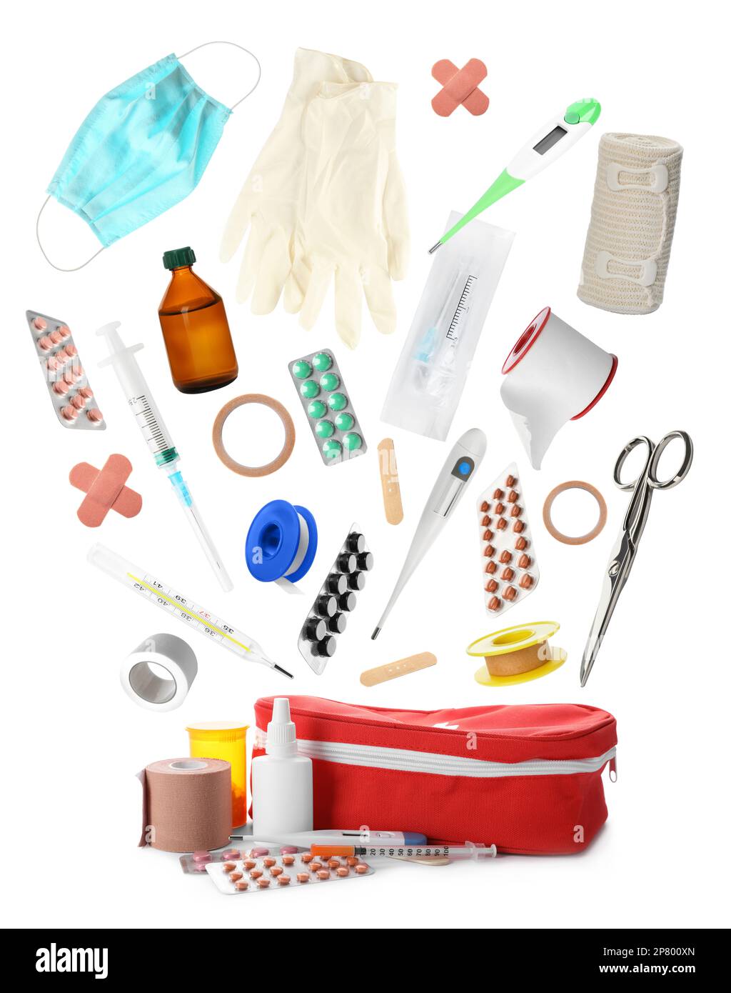 First aid kit. Different medical supplies falling on white background ...