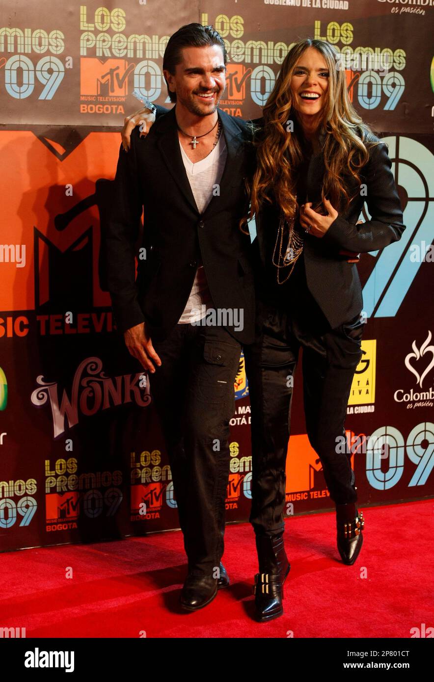 Colombia's singer Juanes, left, and his wife Karen Martinez arrive for ...