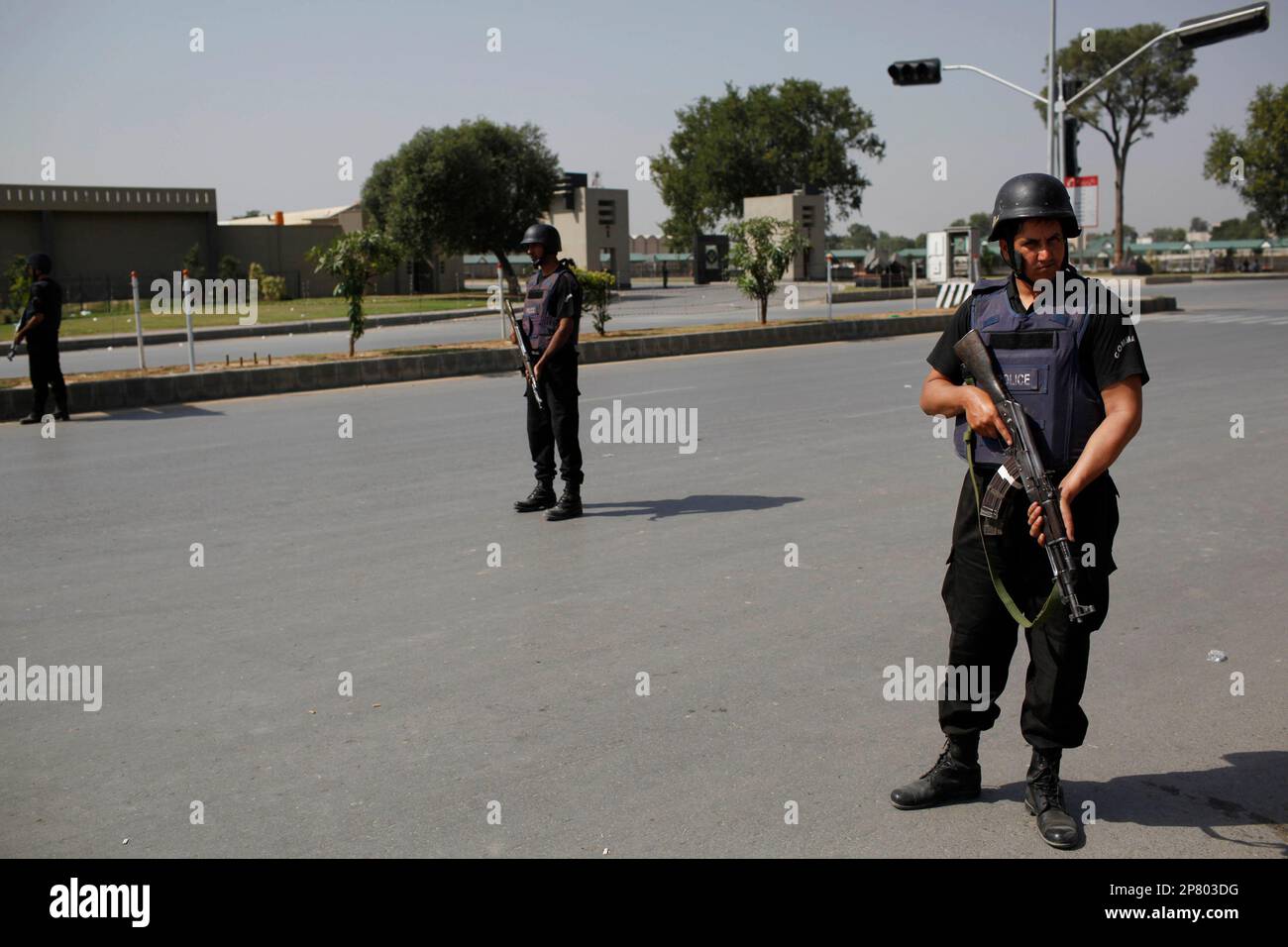 Pakistani commando police officers stand in front of the army's ...