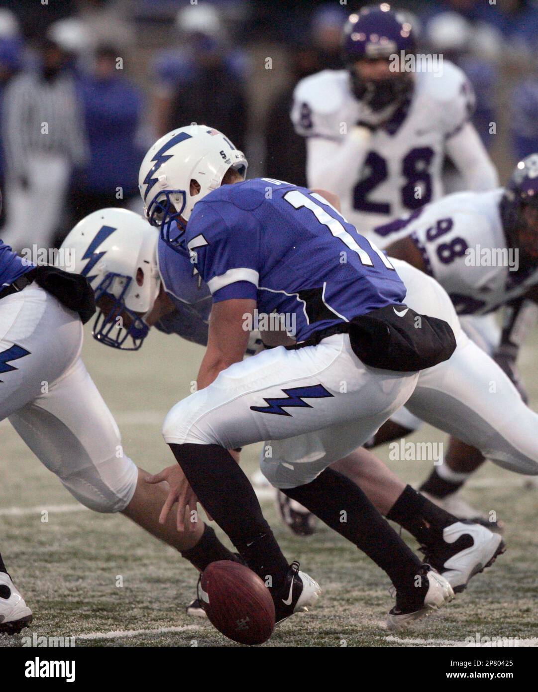 Air Force's quarterback Connor Dietz drops the snap but it is recovered ...