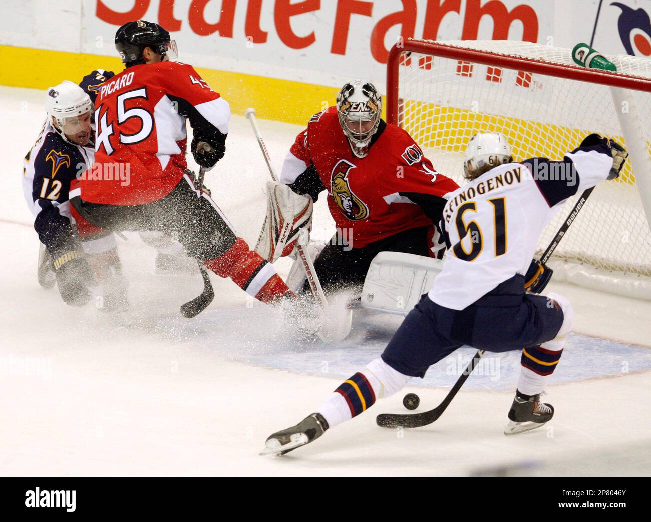 Ottawa Senators' Alexandre Picard (45) fights off Atlanta Thrashers ...