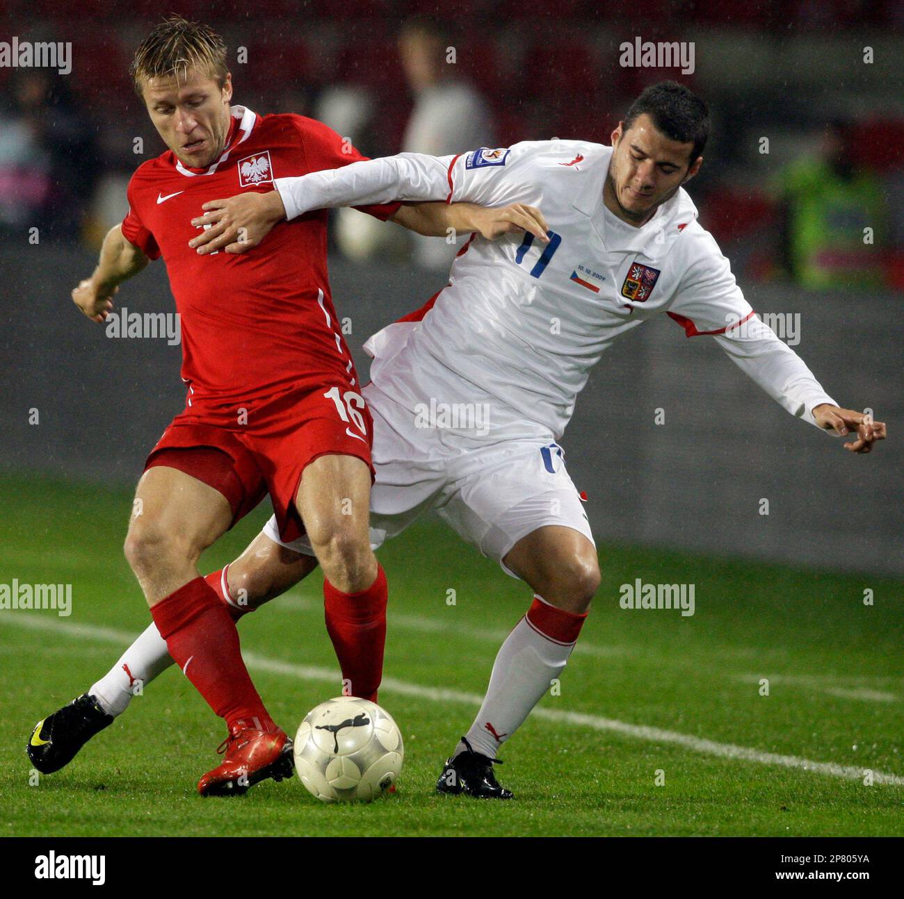 Czech Republic's Daniel Pudil, right, challenges Jakub Blaszczykowski ...