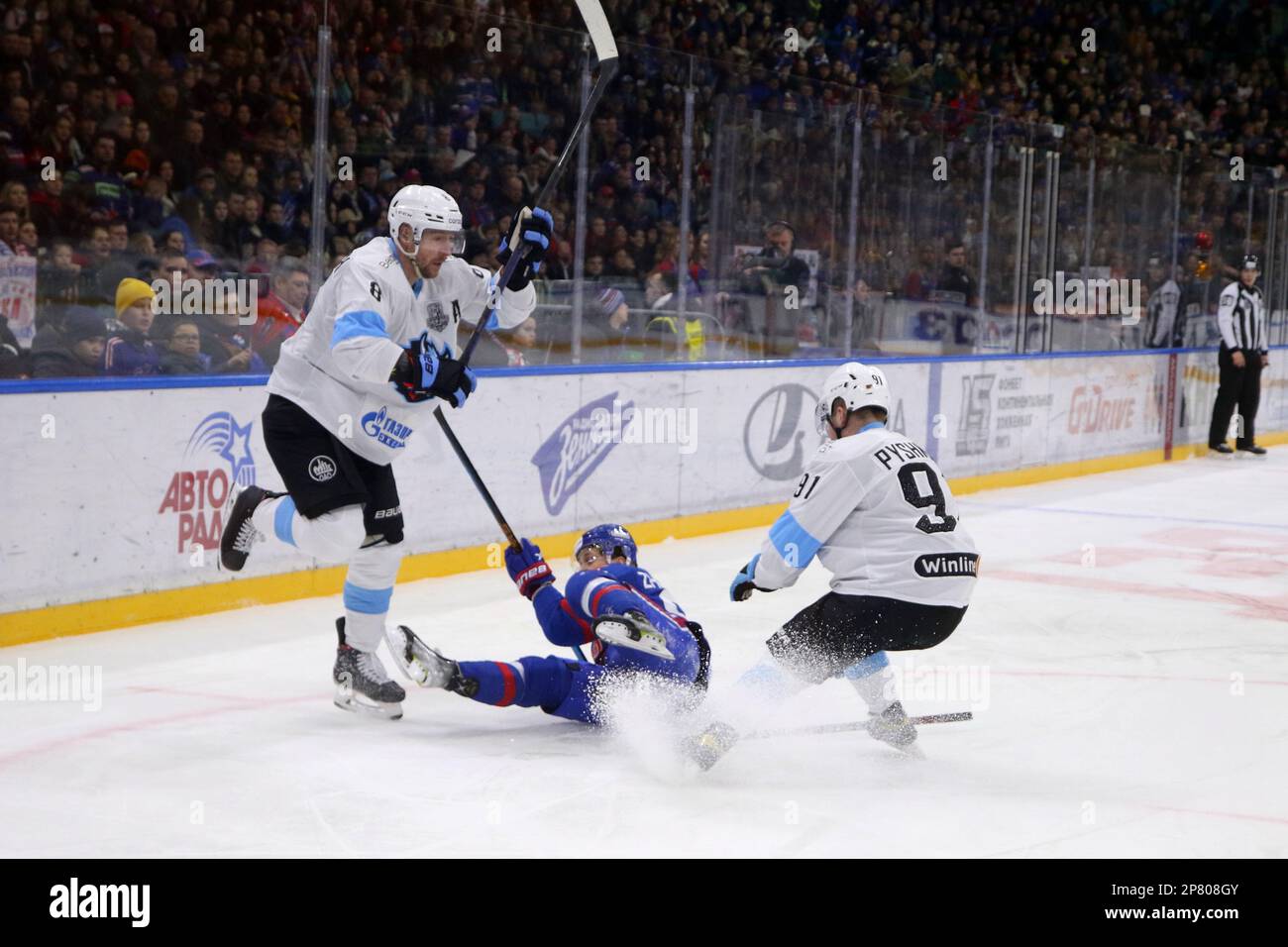 Dinamo Hockey Club player, Ilya Shinkevich (No.8), Nikita Pyshkailo (No ...