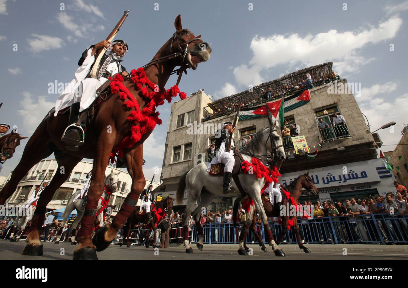 Jordanians take part in the "Centennial Parade" on Friday Oct. 9, 2009 ...