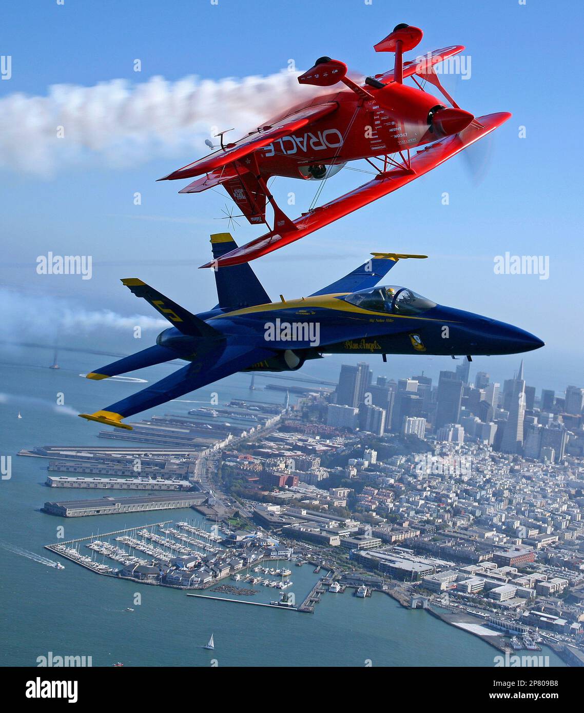 Sean Tucker flies his Oracle Challenger bi-plane inverted over US ...