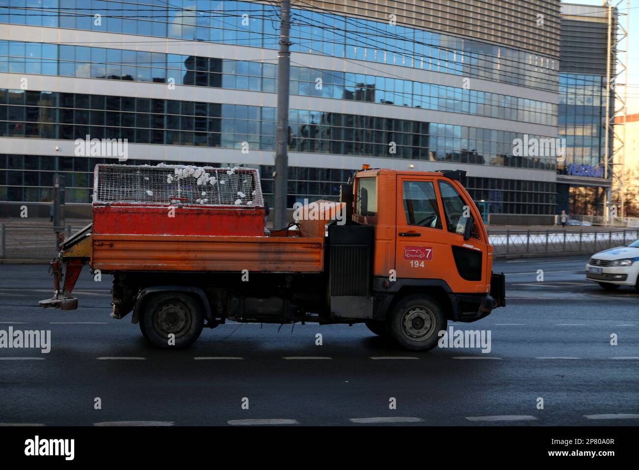 Russian Federation. Saint Petersburg. A utility vehicle is cleaning the ...