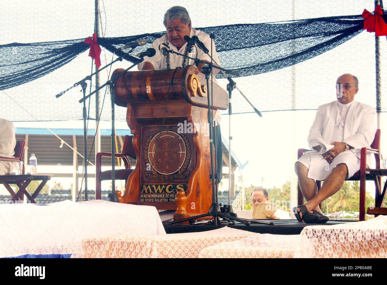 Samoa's Prime Minister Sailele Malielegaoi Tuilaepa, left, speaks at ...