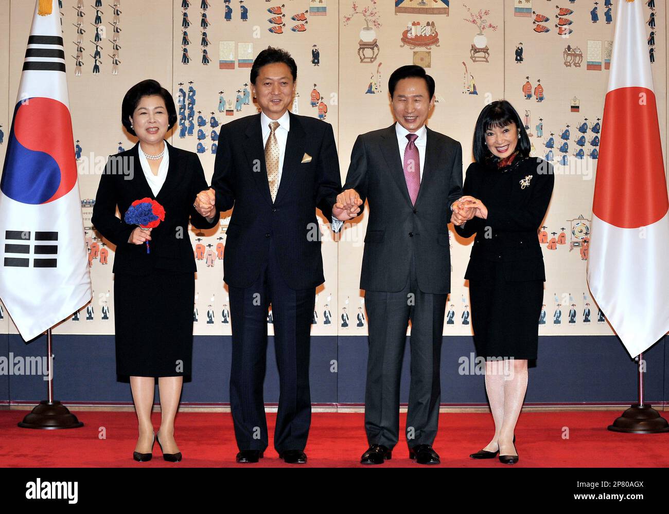 South Korean President Lee Myung-bak, second right, and his wife Kim ...