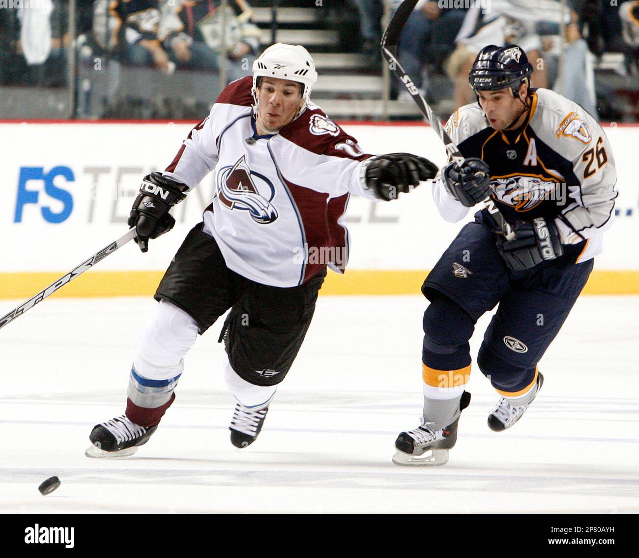 Colorado Avalanche defenseman Scott Hannan, left, and Nashville ...