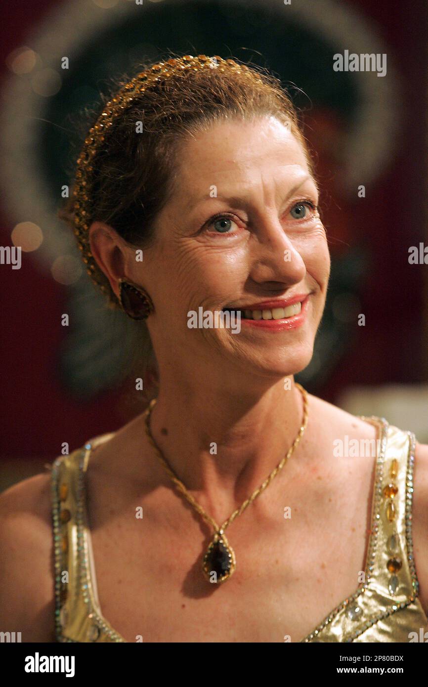 Katherine Reilly poses for photos in a gallery showcasing the history ...