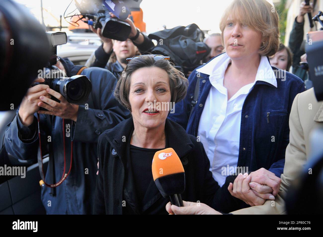 German writer Herta Mueller arrives for a news conference in Berlin ...