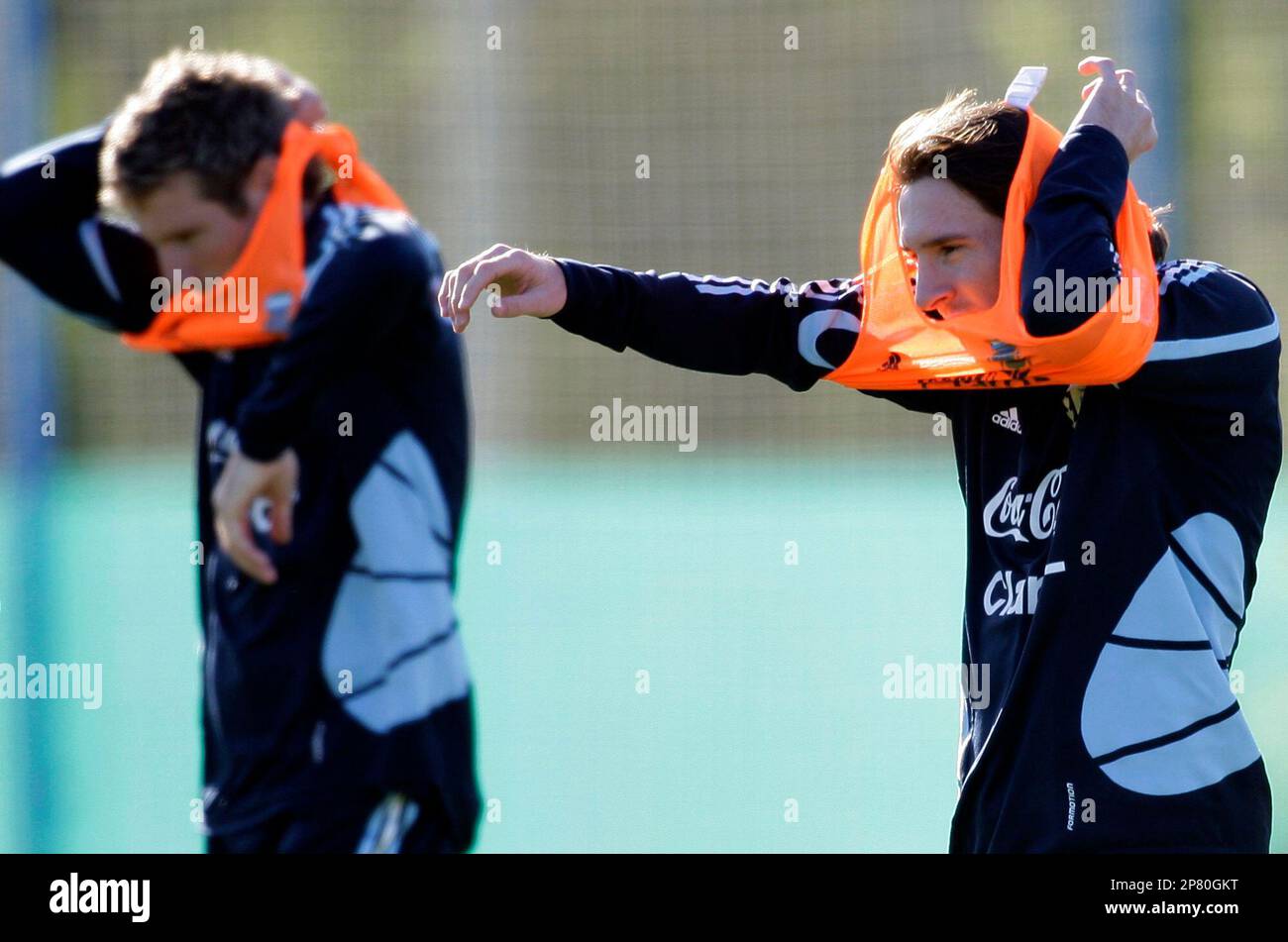 Argentine's Lionel Messi, right, and Martin Palermo, put on vests ...
