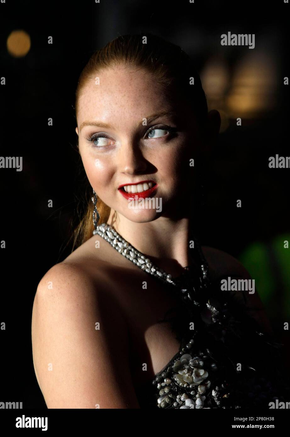 Model and actress Lilly Cole poses for photographs as she arrives at ...