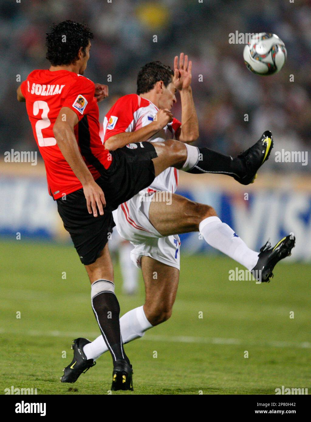 Egypt's Salah Soliman, left, clears the ball in front of Costa Rica's Marcos Urena during their ...