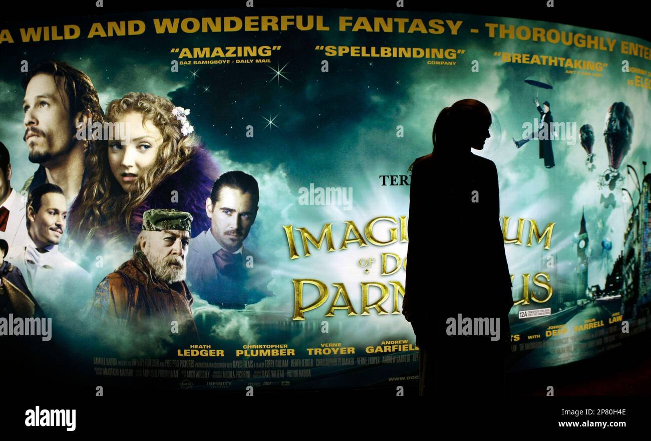 Model and actress Lilly Cole poses for photographs as she arrives at ...