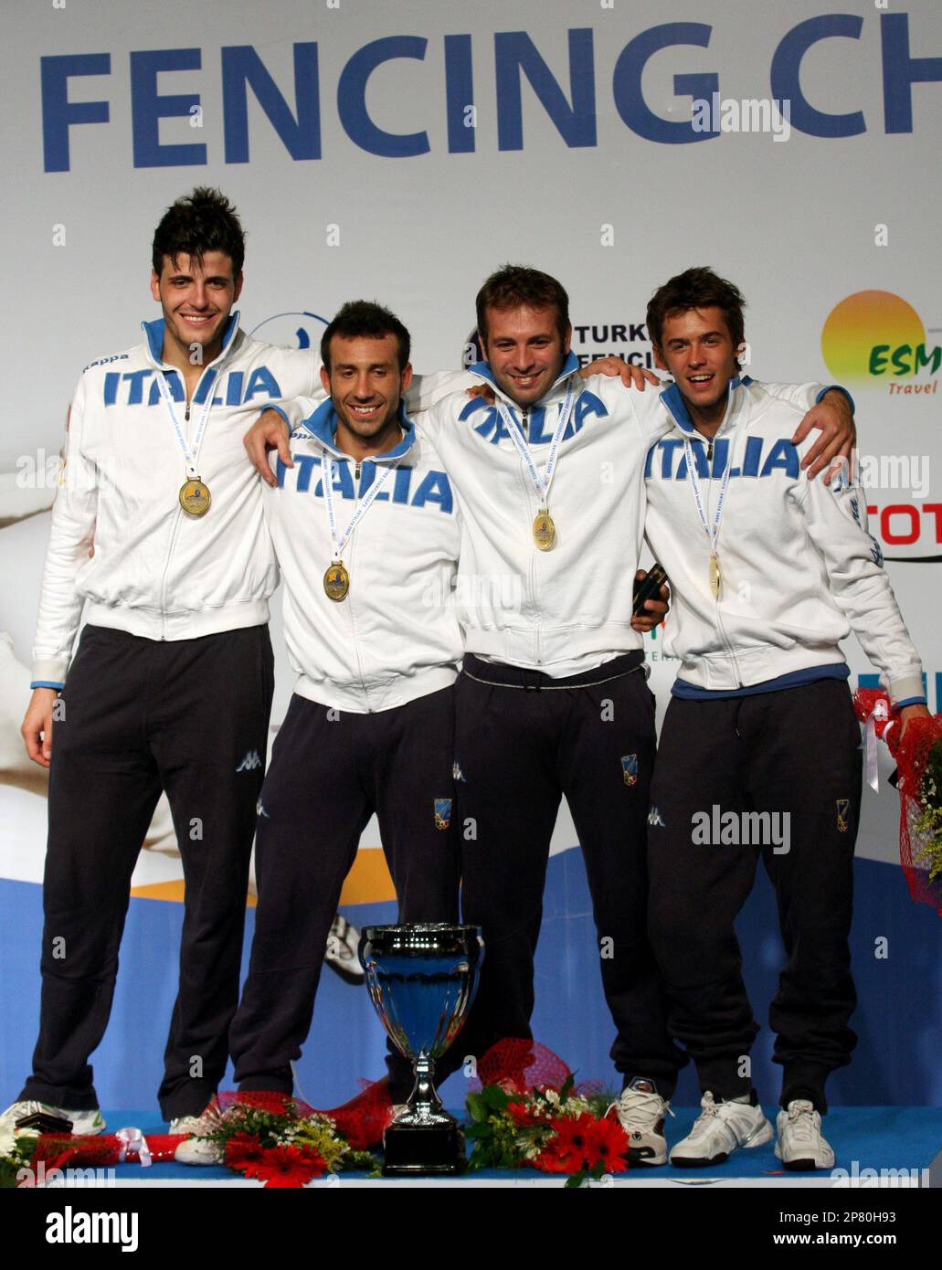 The Italian team celebrate their gold medal in the Fencing World ...