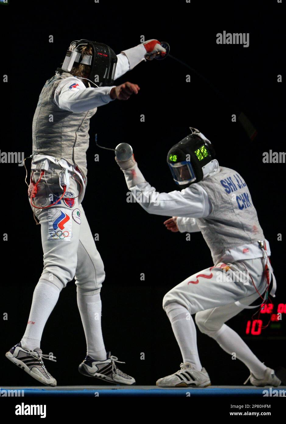 Artem Sedov of Russia, left, and Shi Jialuo of China compete for the ...