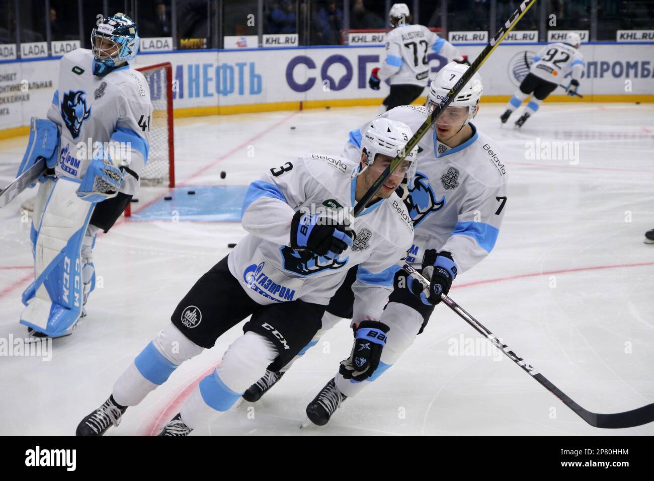 Dinamo Hockey Club player, John Gilmour (No.3), Dmitry Deryabin (No.7 ...
