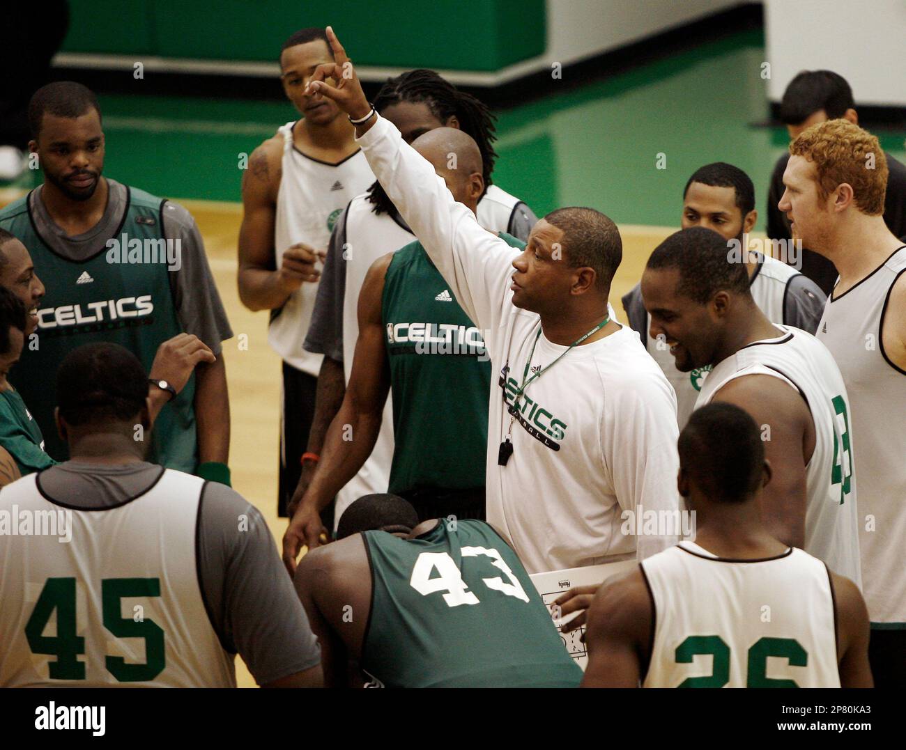 Boston Celtics head coach Glenn "Doc" Rivers speaks to his team at ...