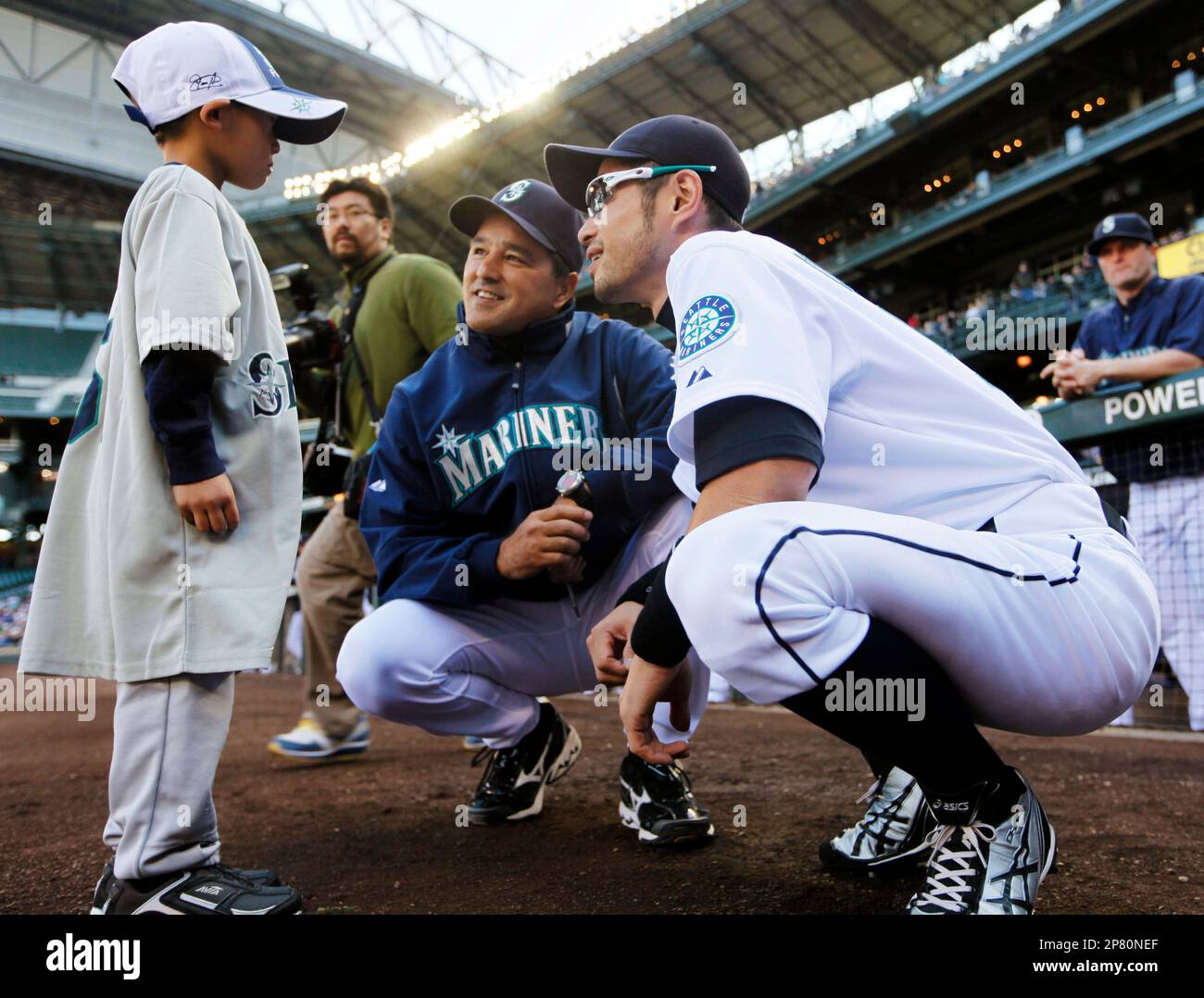 A 6-year-old child, identified only as Holden from Kent, Wash., meets Seattle Mariners' Ichiro ...