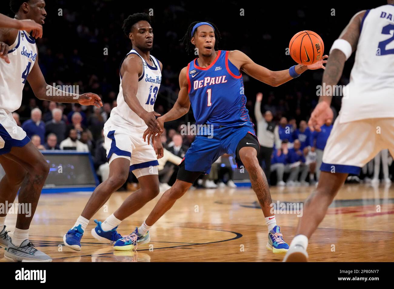 DePaul's Javan Johnson (1) looks to pass against Seton Hall's KC Ndefo ...
