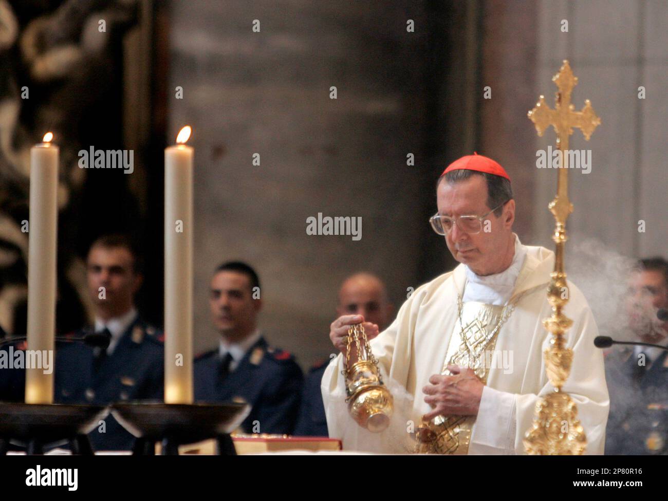 Cardinal Giovanni Laiolo blesses the altar at a mass to mark the ...