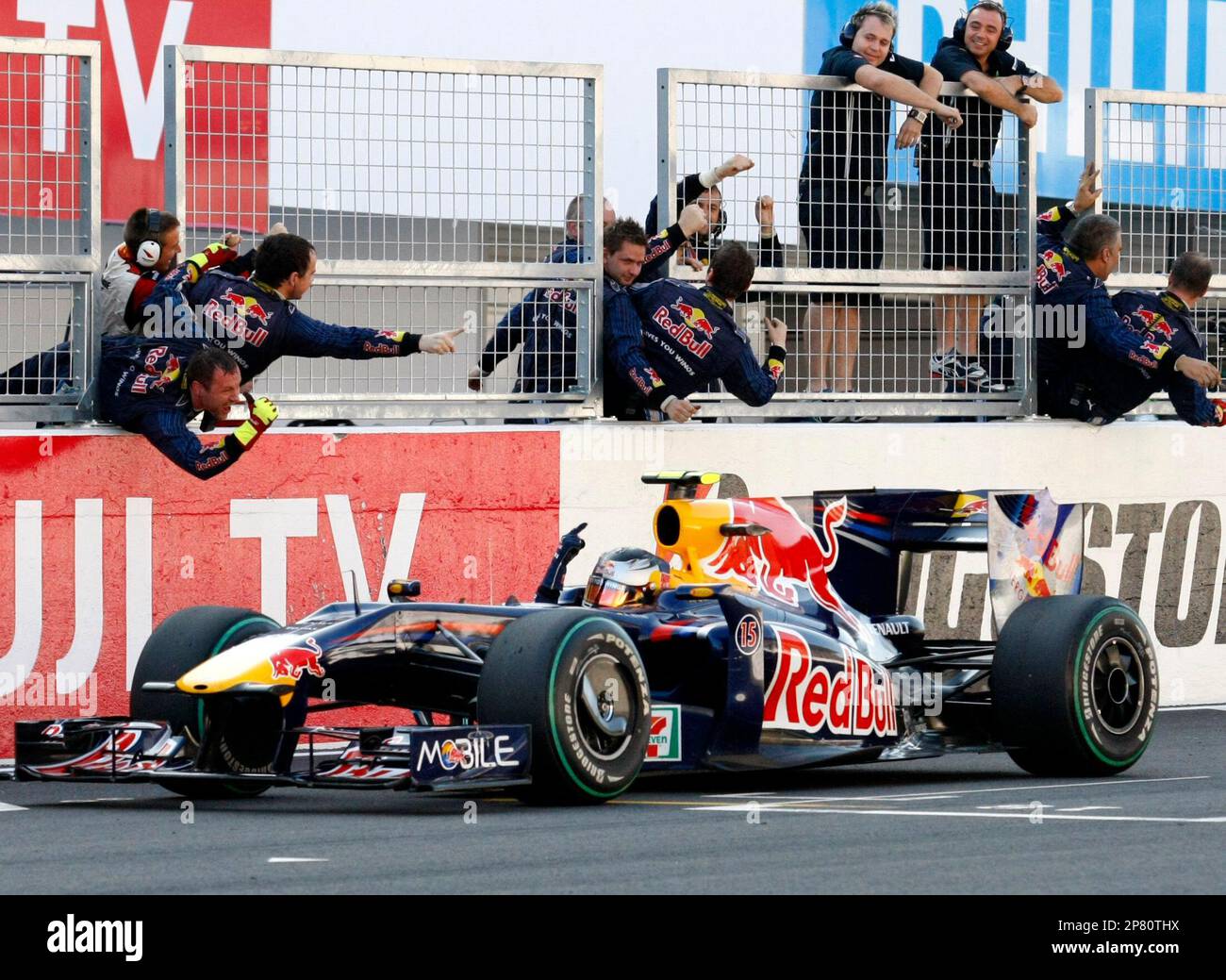 Germany's Formula One driver Sebastian Vettel shows no. 1 sign to his ...