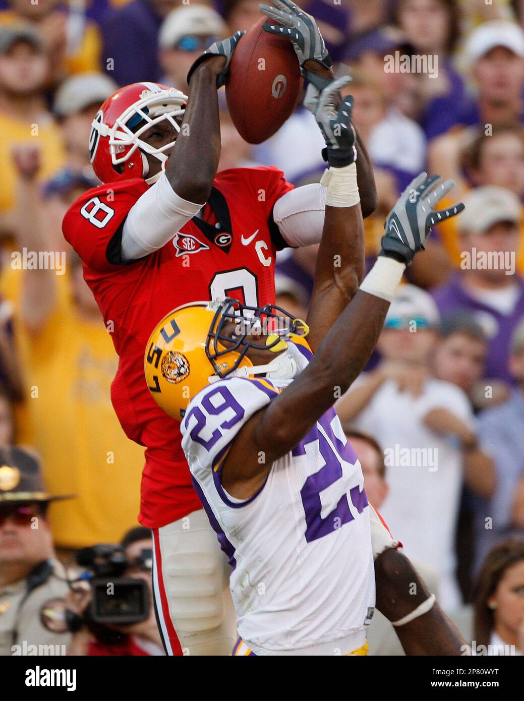 Georgia's A.J. Green (8) makes a catch for a touchdown as LSU's Chris ...