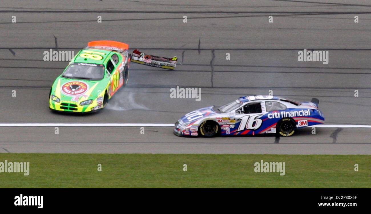 NASCAR driver Patrick Sheltra, left, slides sideways as Greg Biffle (16 ...