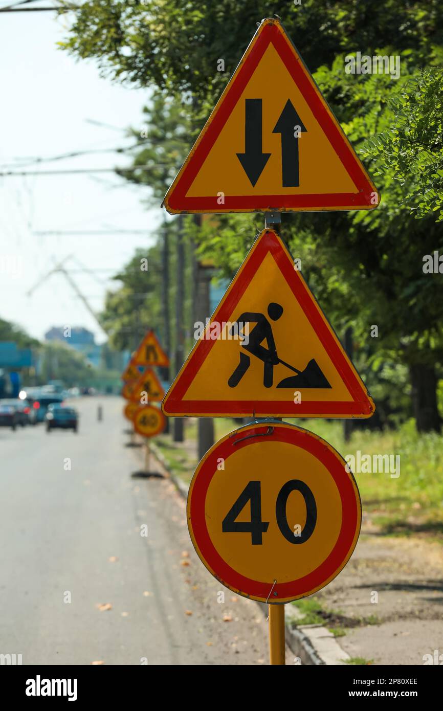 Two red triangle road signs hi-res stock photography and images - Alamy