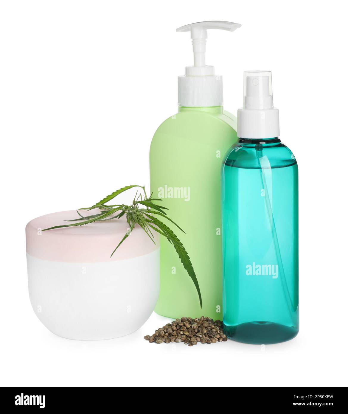 Set of hemp cosmetics with green leaves and seeds isolated on white ...