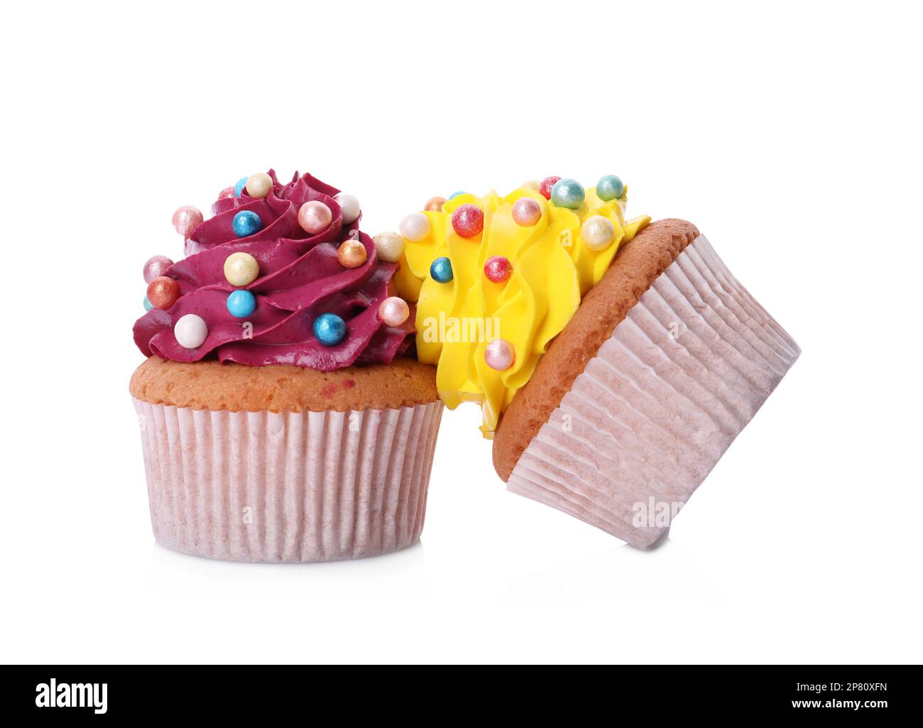 Two failed cupcakes with cream on white background. Troubles happen Stock Photo - Alamy