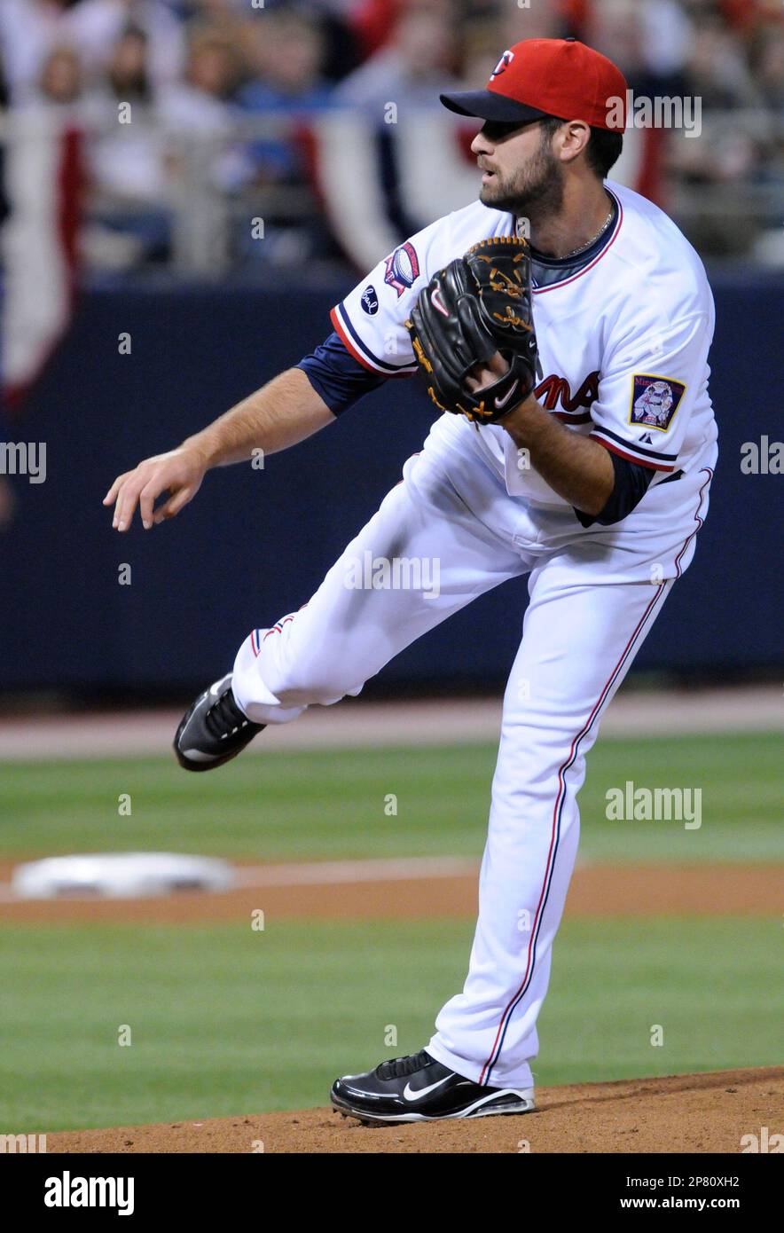 Minnesota Twins pitcher Nick Blackburn throws against the Kansas City ...