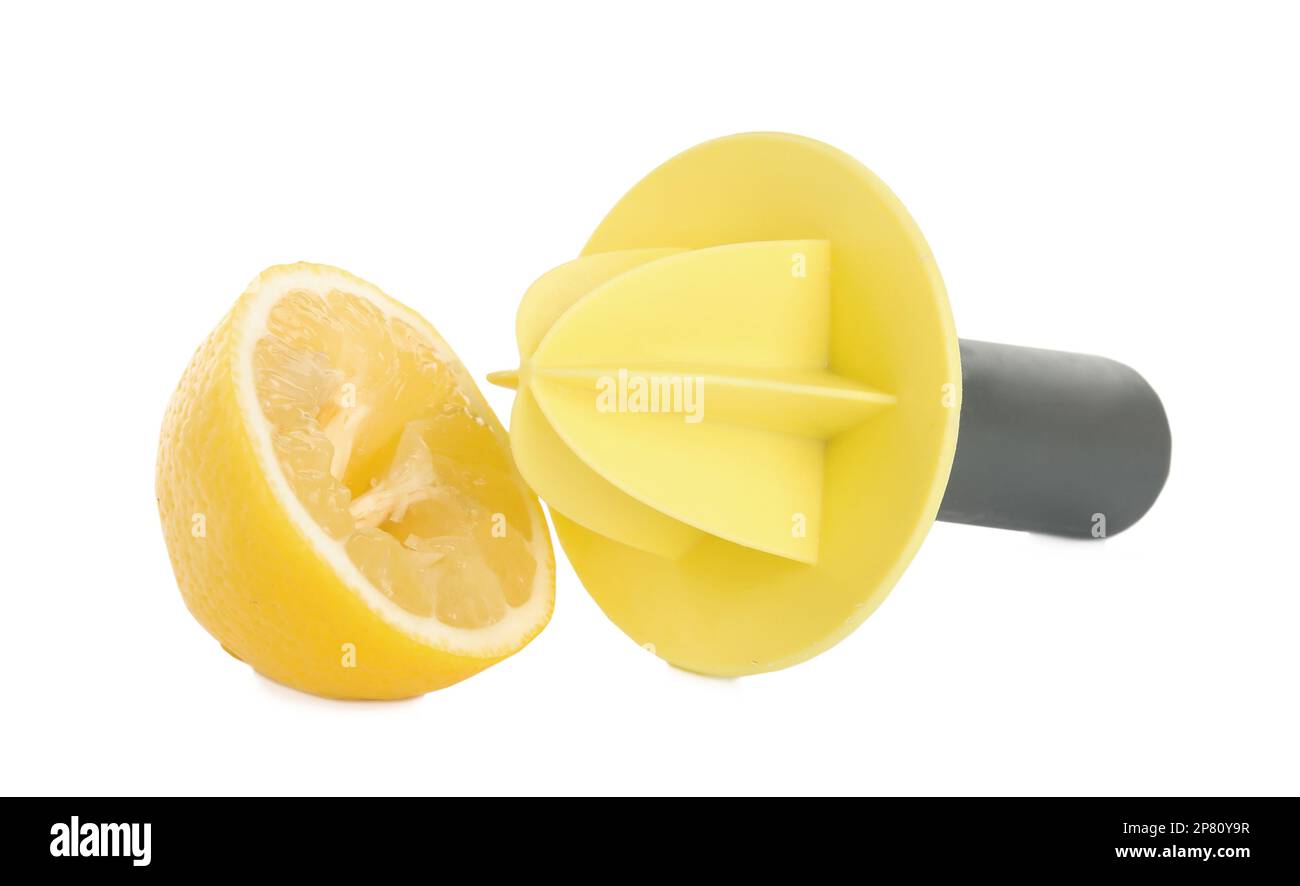 Citrus reamer and fresh lemon on white background Stock Photo - Alamy