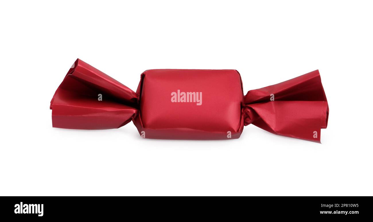Delicious candy in red wrapper isolated on white Stock Photo - Alamy