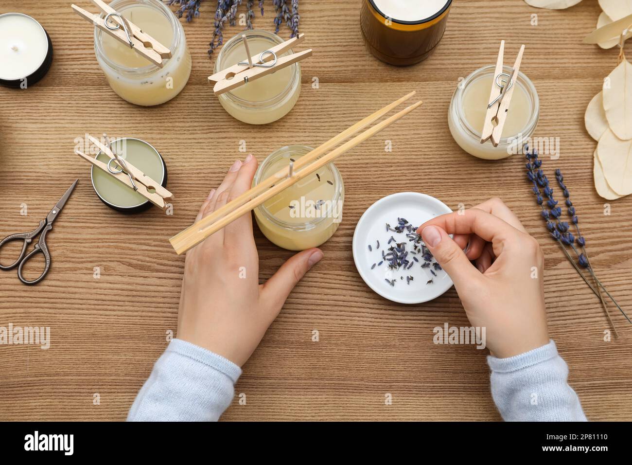 Woman making aromatic candles hi-res stock photography and images - Alamy