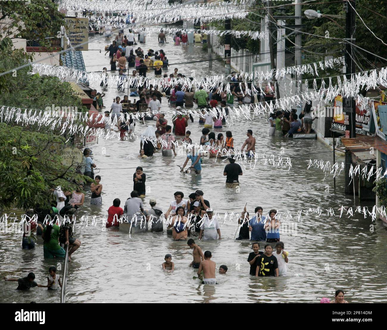 Residents go on with their normal life amidst floodwaters in Taytay ...
