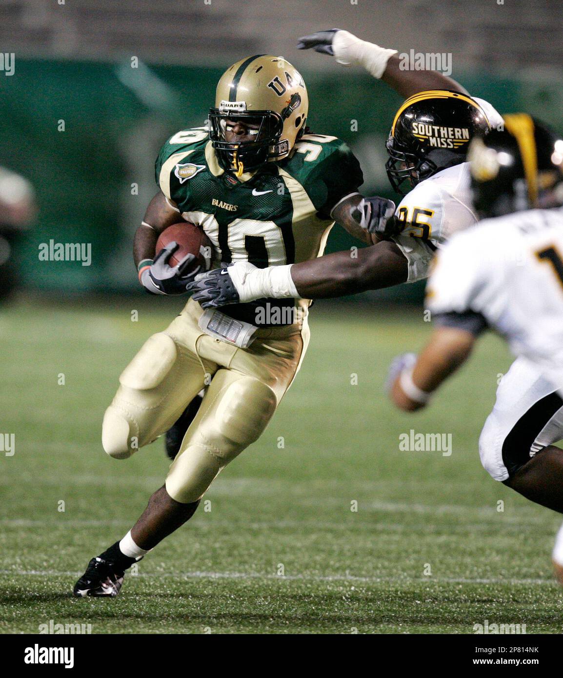 UAB running back Justin Brooks (30) runs for a first down past Southern ...