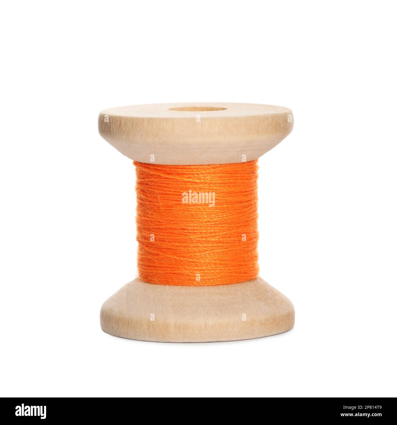 Wooden spool of orange sewing thread isolated on white Stock Photo - Alamy