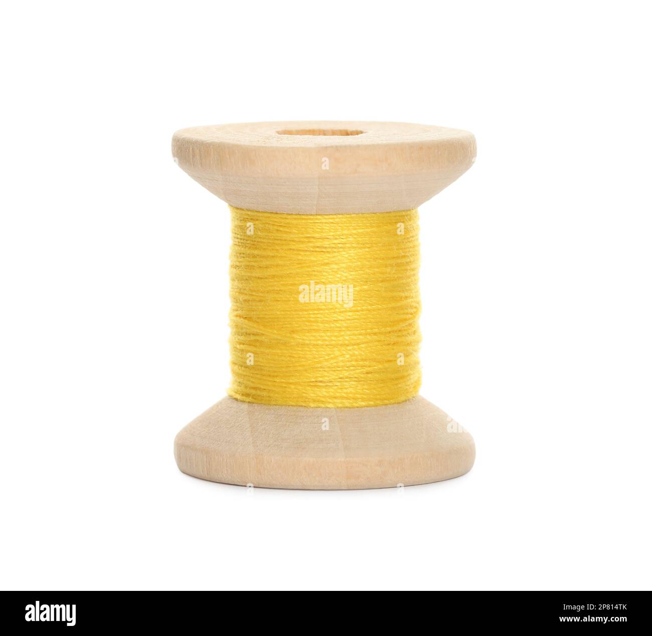 Wooden spool of yellow sewing thread isolated on white Stock Photo - Alamy