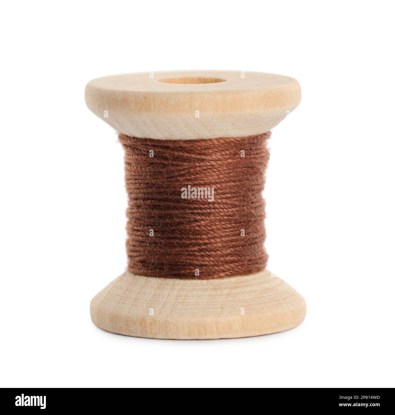 Wooden spool of brown sewing thread isolated on white Stock Photo - Alamy