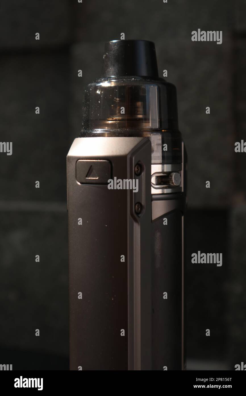 Vape on a dark background. The concept of vaping. VAPE shop. Smoking ...
