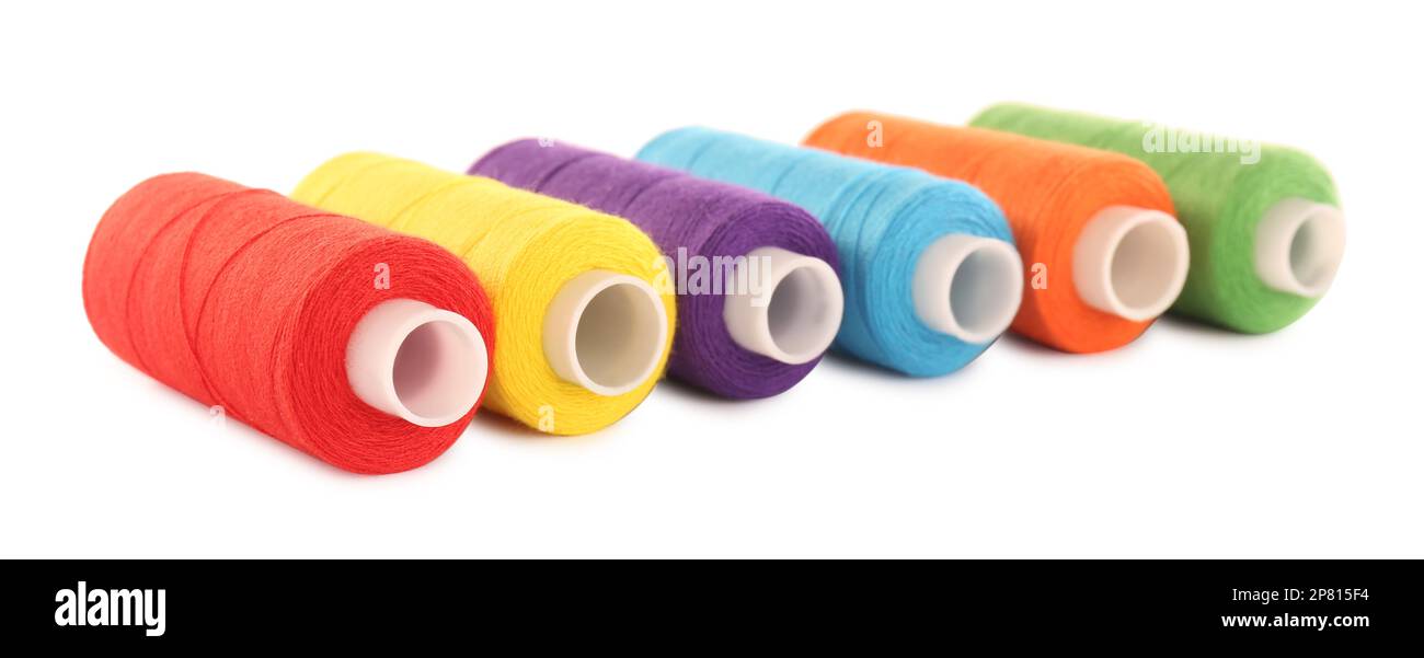 Set of colorful sewing threads on white background Stock Photo - Alamy