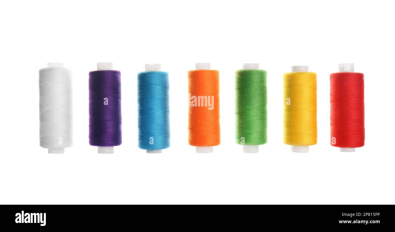 Set of colorful sewing threads on white background Stock Photo - Alamy
