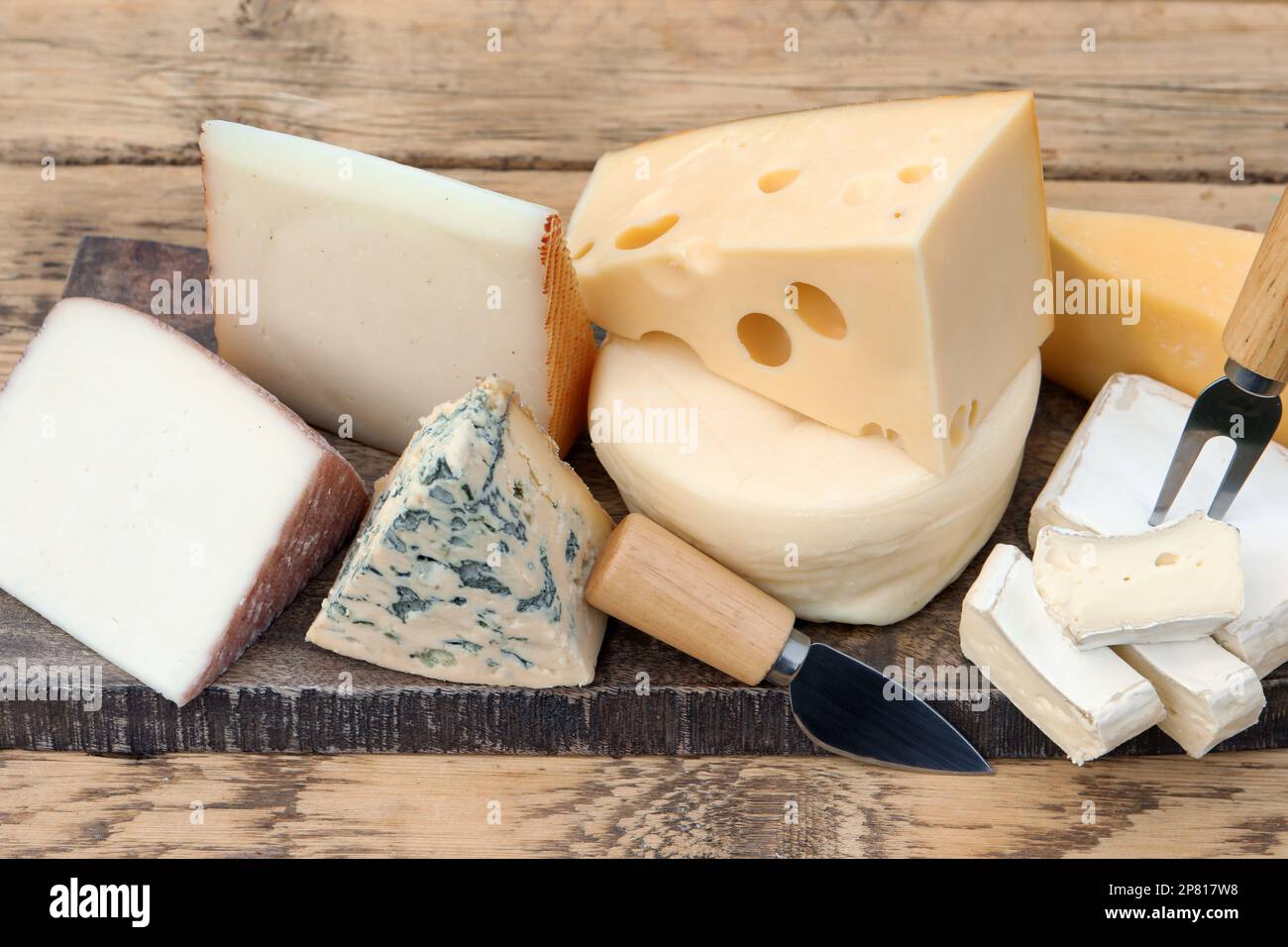 Different delicious cheeses fork hi-res stock photography and images ...