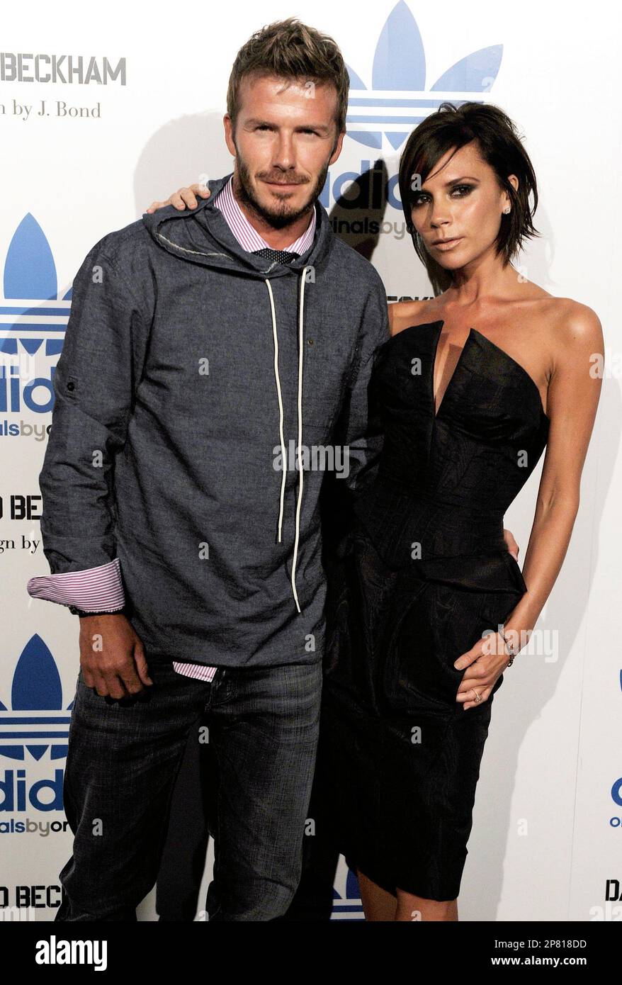 David Beckham, left, and his wife Victoria arrive to celebrate the ...