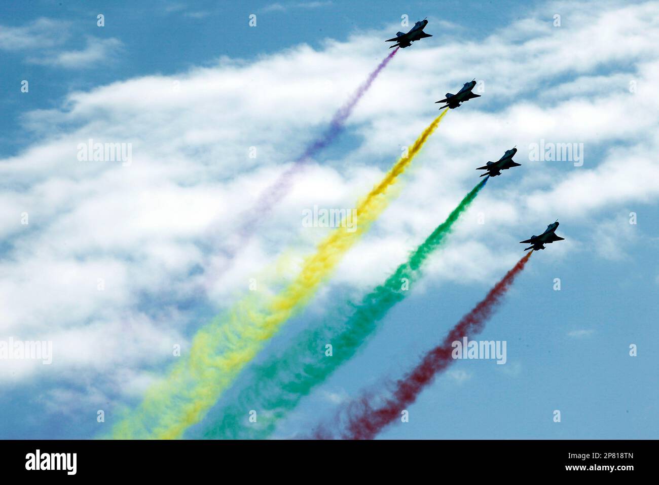 Military planes fly in formation towards Tiananmen Square during a ...