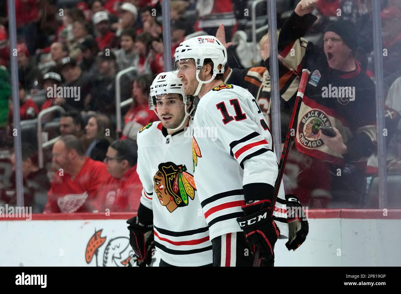Chicago Blackhawks right wing Taylor Raddysh (11) celebrates his goal ...