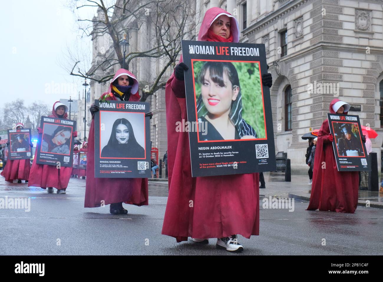 London, UK. 8th March, 2023. British-Iranian women dressed in cloaks ...