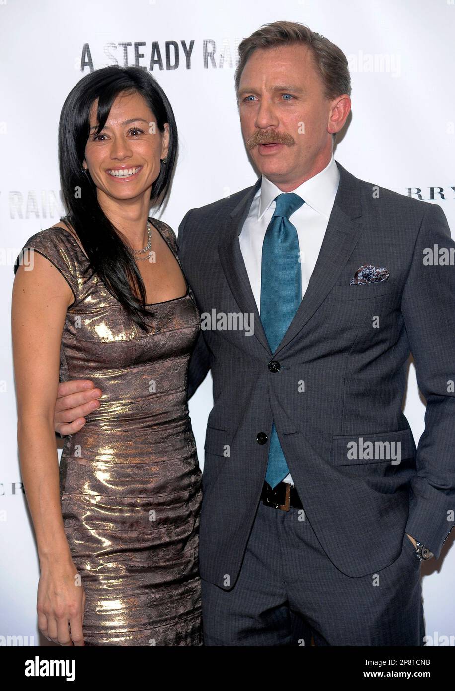 Actor Daniel Craig and girlfriend Satsuki Mitchell pose during a photo ...